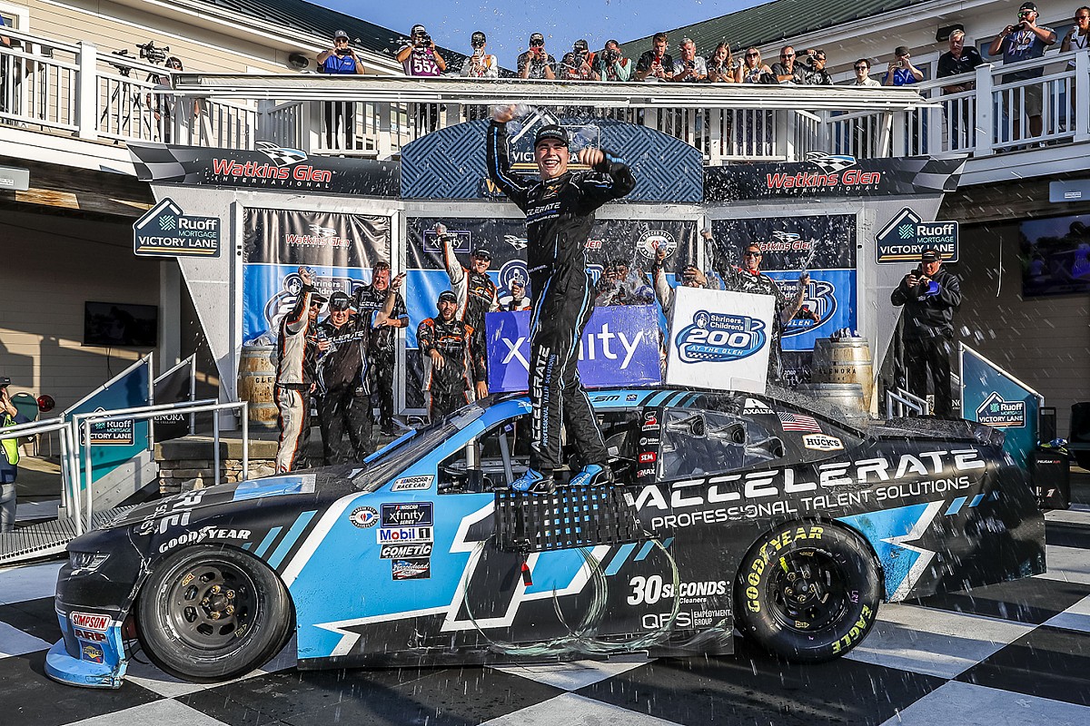 Mayer spins Gibbs, then wins Xfinity race at Watkins Glen